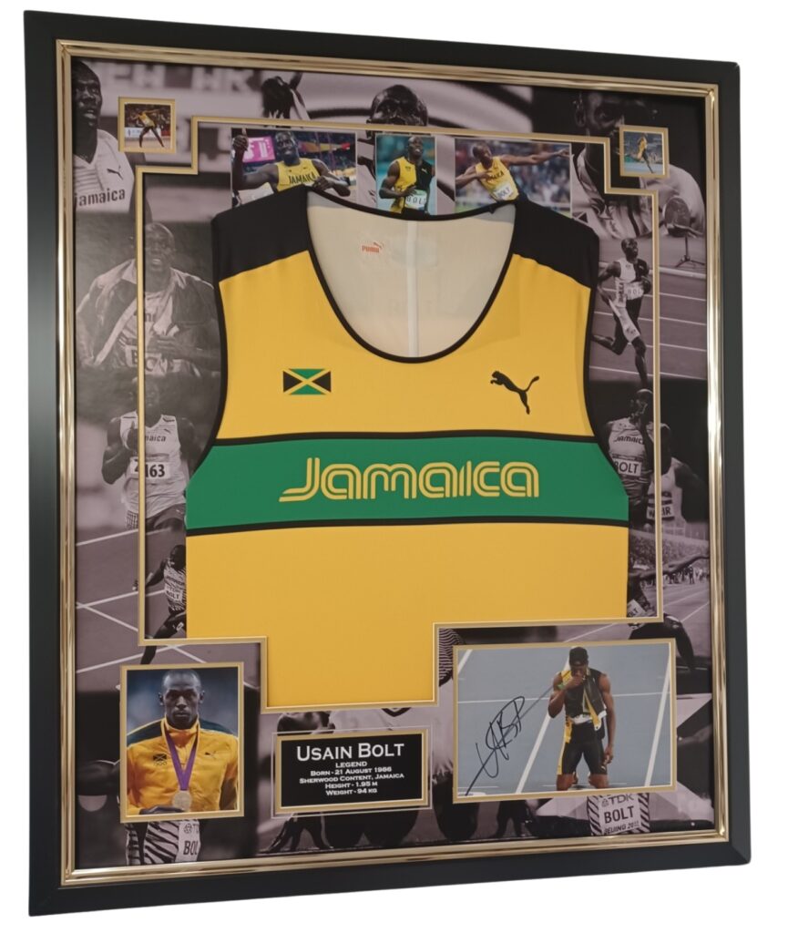 Framed Usain Bolt Signed Picture with Jamaica Vest – Signed Memorabila Shop