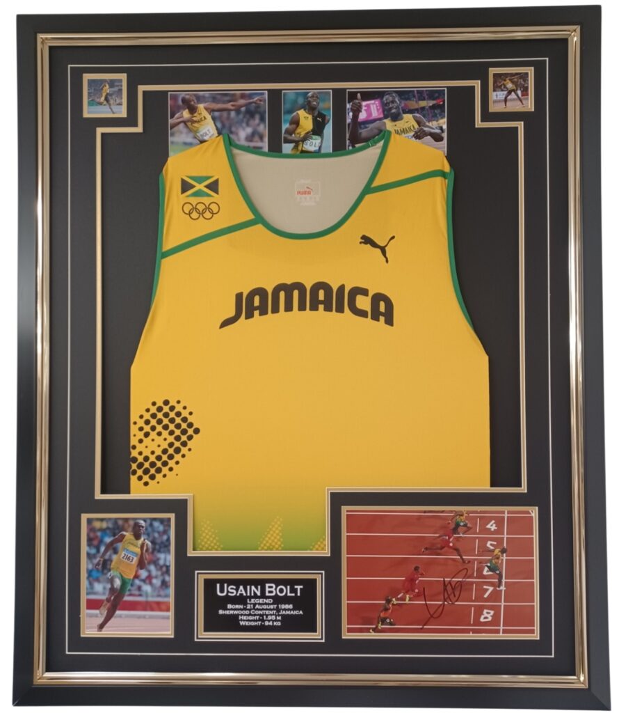 Framed Usain Bolt Signed Picture with Jamaica Vest – Signed Memorabila Shop